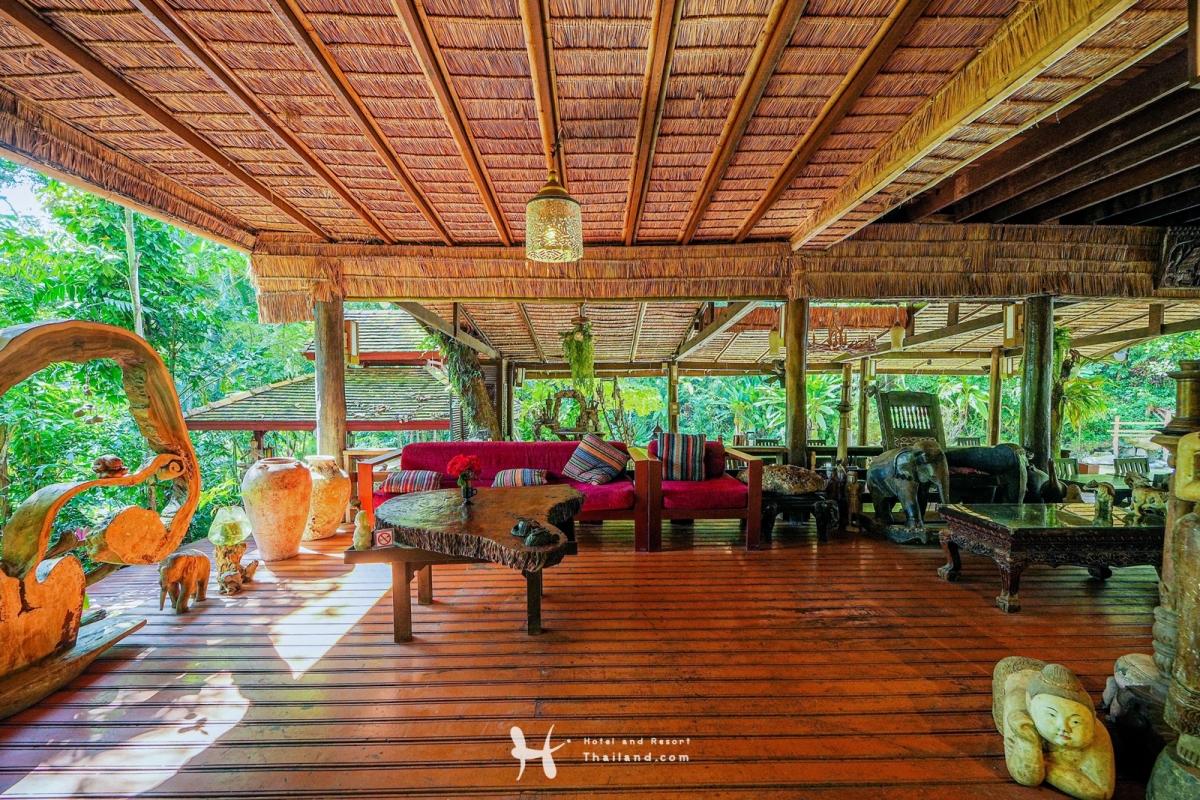 The lobby of the resort offers a view of the waterfall, and in fact ...